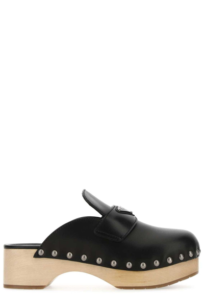 Prada Triangle Logo Studded Clogs In Black | ModeSens