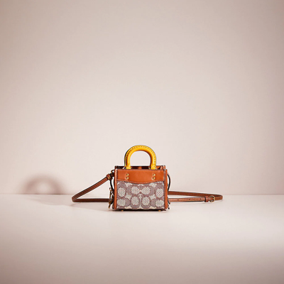 Coach Restored Rogue 12 In Signature Textile Jacquard In Brass/cocoa ...