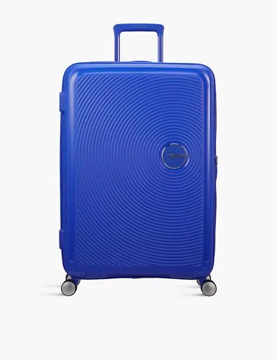 American Tourister Cobalt Blue Soundbox Expandable Four-wheel Suitcase ...