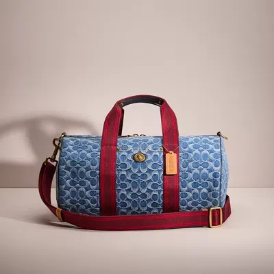 Coach Restored Duffle In Signature Denim In Washed Denim | ModeSens