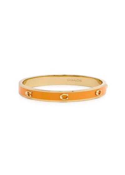 Coach Signature Logo Bangle In Orange | ModeSens