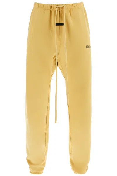 Fear Of God Essential Heavy Fleece Sweatpants In Yellow | ModeSens