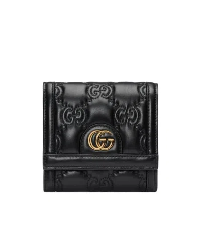 Gucci Gg Matelassé Tri-fold Wallet In Black | ModeSens