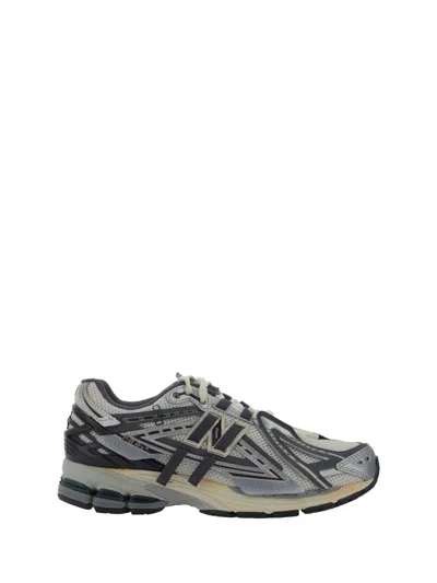 New Balance Sneakers In Silver | ModeSens
