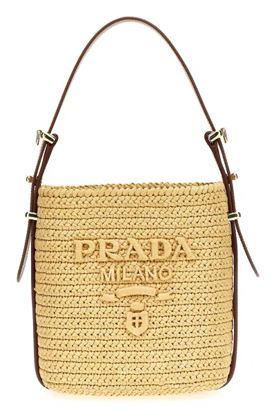 Prada Women Logo Raffia Bucket Bag In Cream | ModeSens