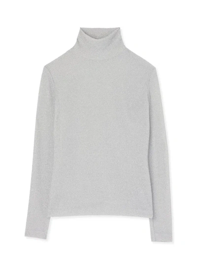 St John Metallic Knit Turtleneck Top In Silver | ModeSens