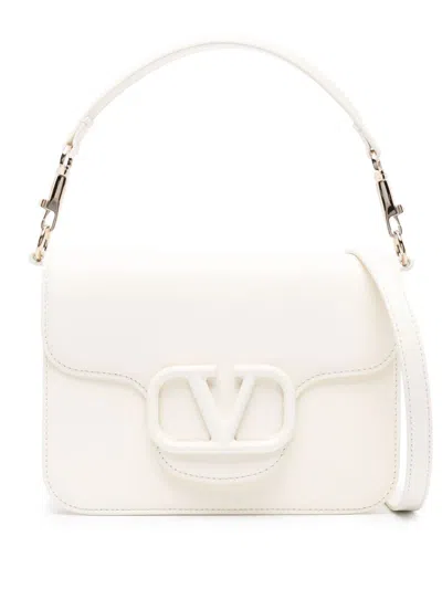 Valentino Garavani Locò Leather Shoulder Bag In White | ModeSens
