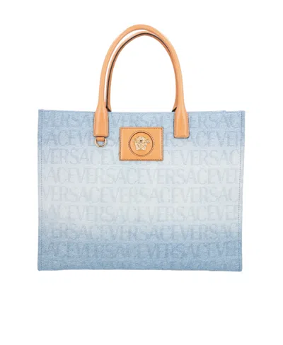 Versace Logo-embossed Tote Bag In White | ModeSens