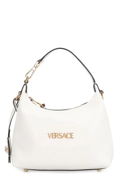 Versace Tag Hobo Bag In Leather With Embossed Logo In White | ModeSens