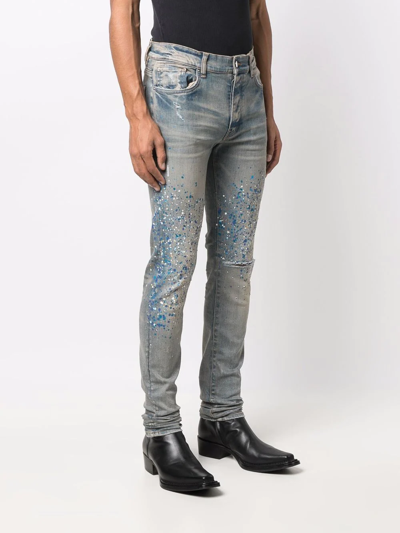 Amiri Paint-splatter Detail Denim Jeans In 蓝色 | ModeSens