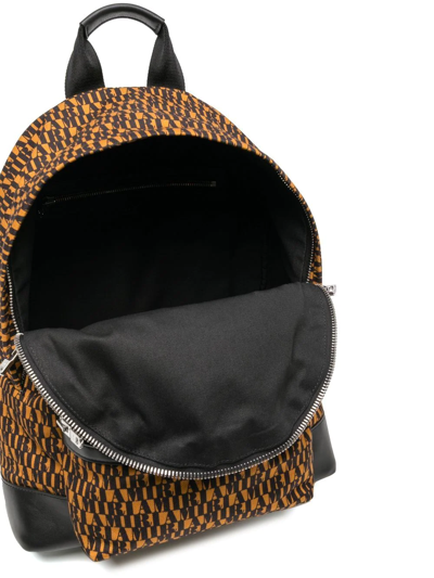 Amiri Monogram-print Backpack In Yellow | ModeSens