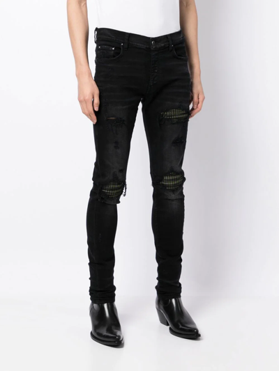 Amiri Black Distressed-finish Ripped Skinny Jeans | ModeSens