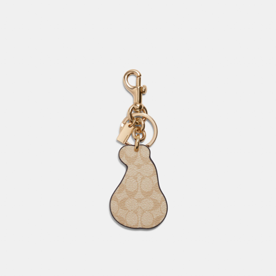 Coach Outlet Pear Bag Charm In Signature Canvas In Yellow | ModeSens
