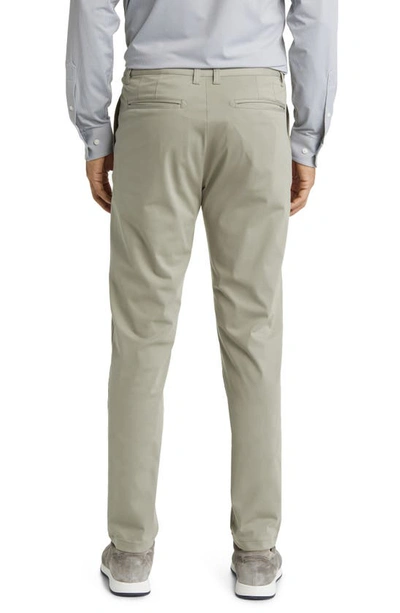 Rhone Commuter Slim Fit Pants In Sage Green | ModeSens