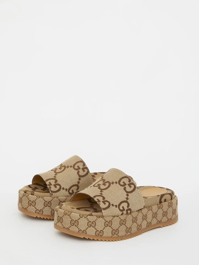 Gucci Gg Slider Sandals In Beige | ModeSens