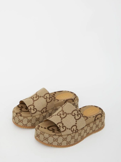 Gucci Gg Slider Sandals In Beige | ModeSens
