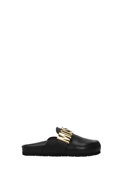 Moschino Slippers And Clogs Leather Black Gold | ModeSens