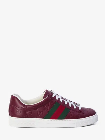 Gucci Men's Ace Gg Embossed Leather Low-top Sneakers In Red | ModeSens