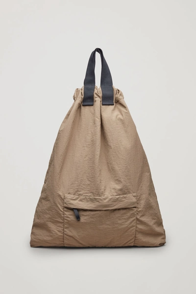 Cos Technical Drawstring Backpack In Beige | ModeSens