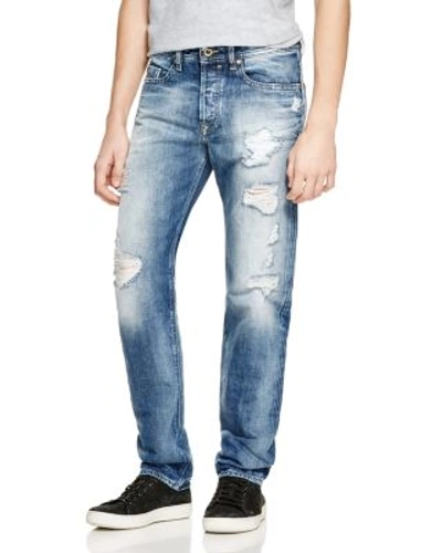 Diesel Buster Destroyed New Tapered Fit Jeans In Denim | ModeSens